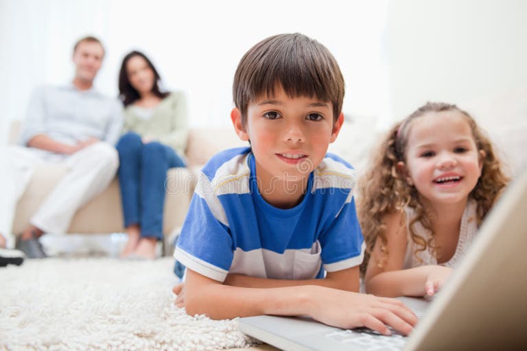 Cute Kids Playing Computer Games on Laptop Stock Image - Image of ...