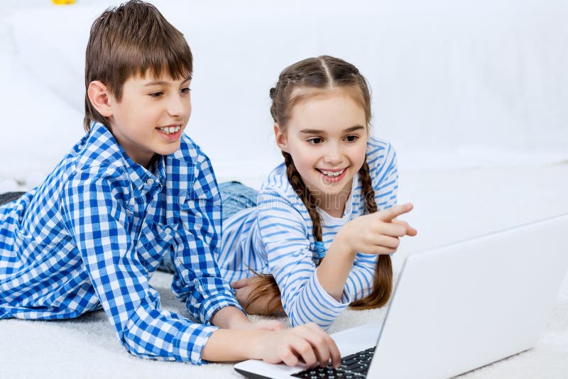 Cute kids using devices stock photo. Image of child, music - 66440360