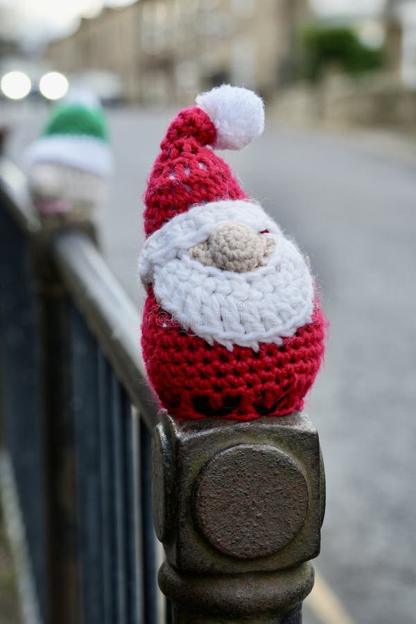 A Knitted Santa Sitting on an Iron Post in Yorkshire, England. Stock ...
