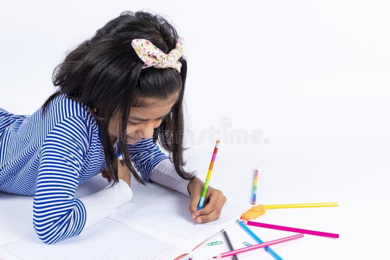 Cute Left-handed Girl is Writing with a Pencil Stock Photo - Image of ...
