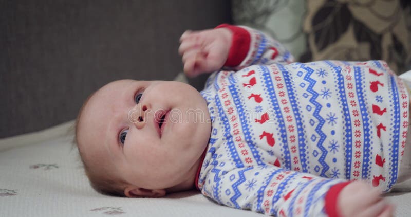 Little Baby Boy Lying on Back at Home. Stock Video - Video of closeup ...