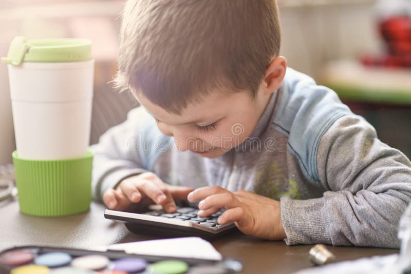 Cute Little Baby Boy Using a Calculator Stock Image - Image of ...