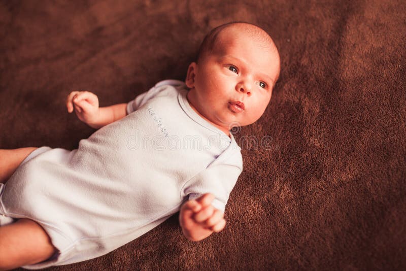 Cute little baby stock image. Image of lying, generation - 49911215