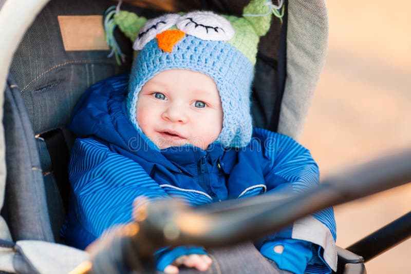 Cute Little Baby in a Stroller Stock Photo - Image of little, baby ...
