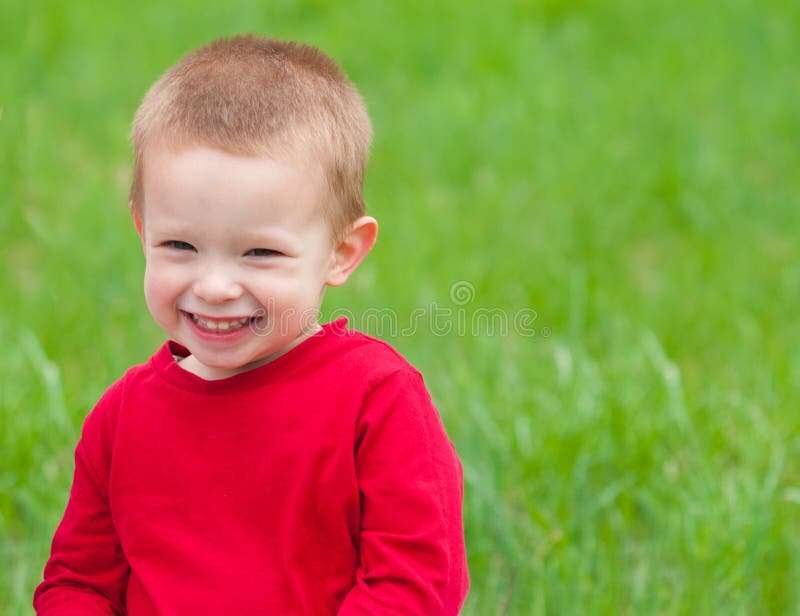Cute Little Boy with Beautiful Smile Stock Photo - Image of green ...