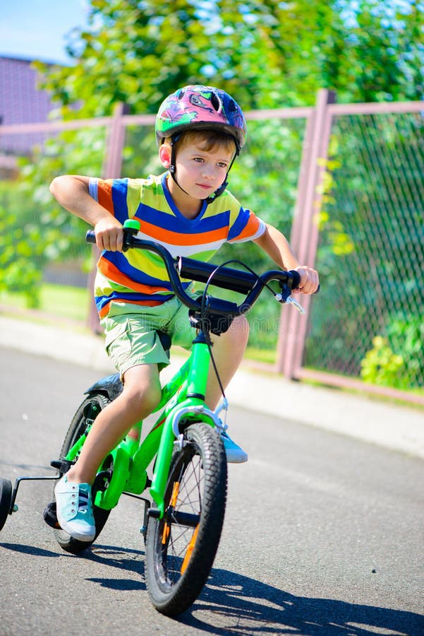 Cute little boy in bicycle stock image. Image of preschooler - 35042715