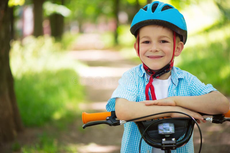Cute little boy on bike stock image. Image of caucasian - 56228013