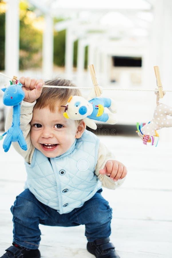 Cute Little Boy in Blue with Toys Stock Image - Image of cute, happy ...