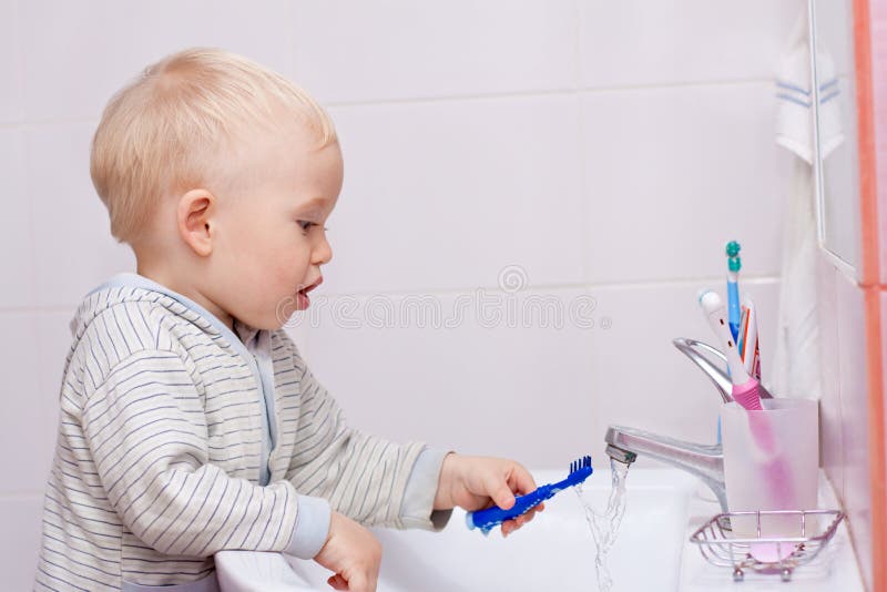 Cute Little Boy Cleaning His Teeth Stock Photo - Image of toothbrush ...