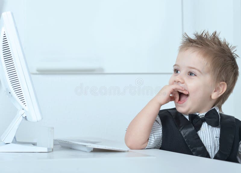 Cute Little Boy with Computer Stock Image - Image of person, technology ...