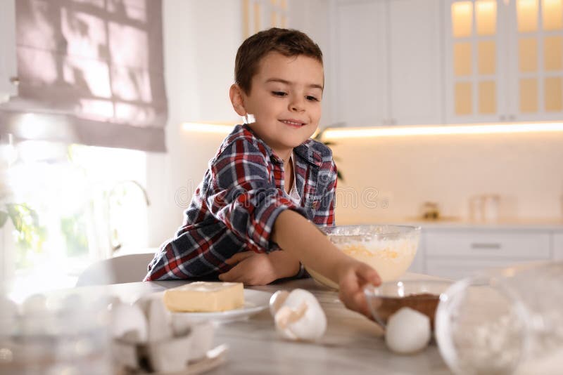 Cute Little Boy Cooking Dough in Kitchen Stock Image - Image of ...