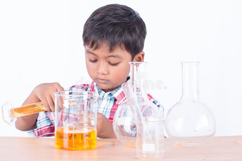 Cute Little Boy Doing Science Experiment Stock Photo - Image of teenage ...