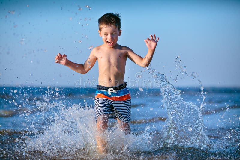 Child, Water and Fun. Beach Fun Stock Photo - Image of laughing ...