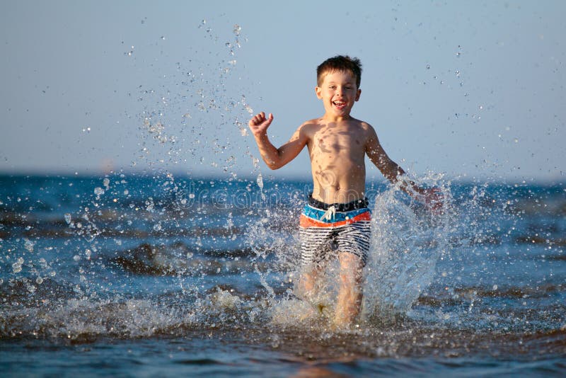 Cute Little Boy Having Fun at the Beach Stock Photo - Image of outdoor ...