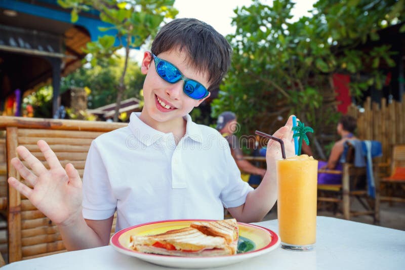 Cute Little Boy Having Lunch in Restaurant Stock Image - Image of enjoy ...