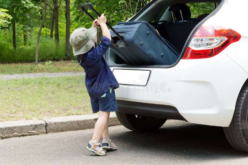 Cute Little Boy Loading His Case Stock Image - Image of childhood ...