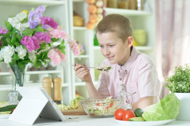 Cute Little Boy Making Dinner Stock Photo - Image of health, nutrition ...