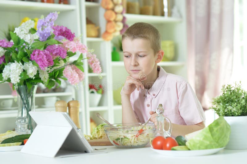 Cute Little Boy Making Dinner Stock Photo - Image of european, food ...