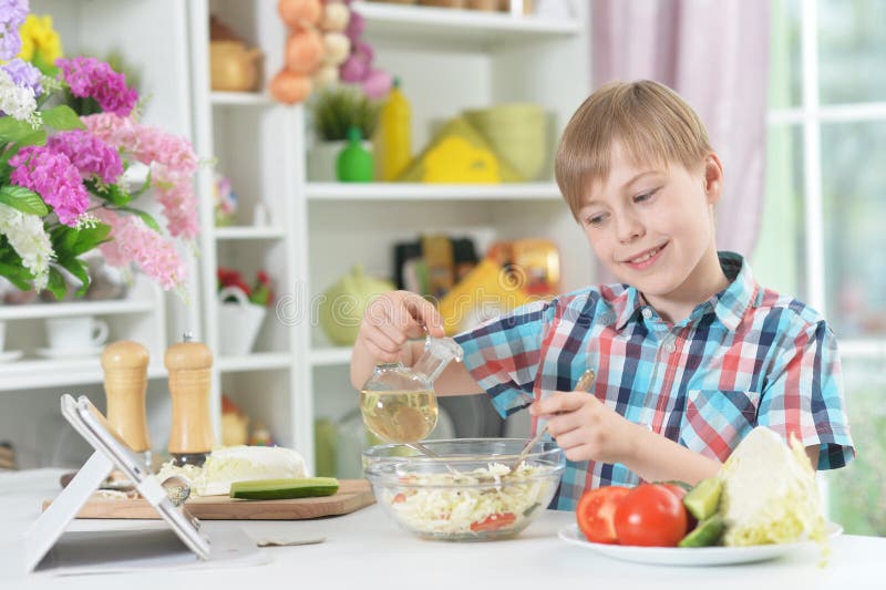 Cute Little Boy Making Dinner Stock Photo - Image of diet, people ...