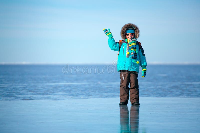 Cute Little Boy Outdoors Standing Frozen Sea Stock Photos - Free ...