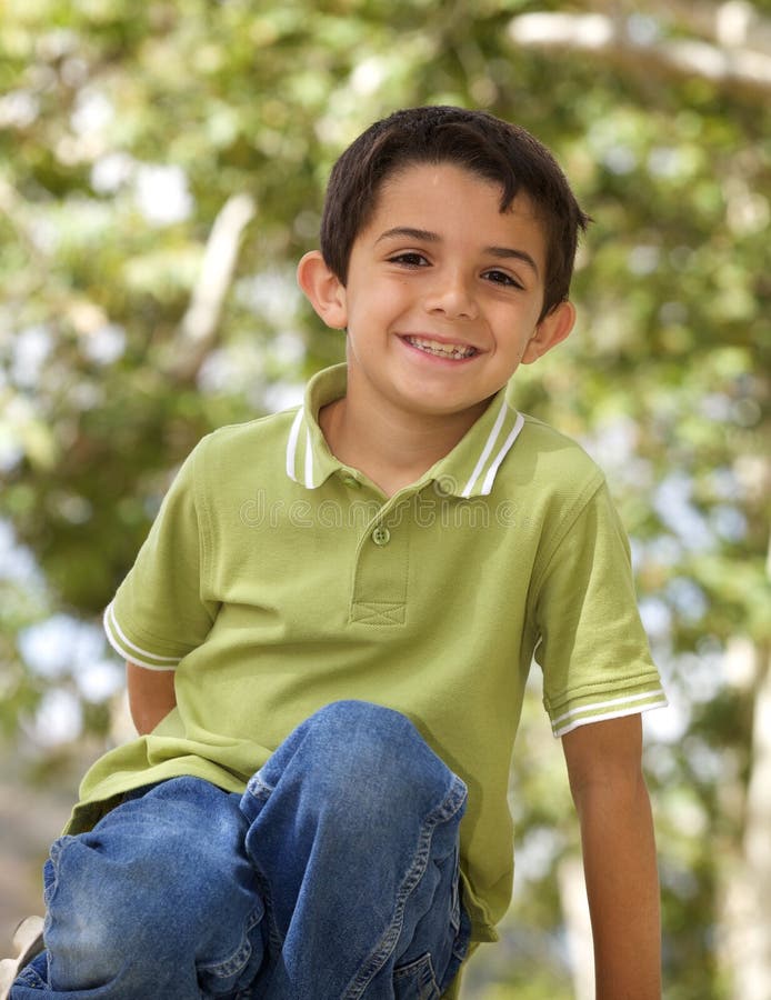 Cute Little Boy Outside in a Tree Stock Photo - Image of sunny, camera ...