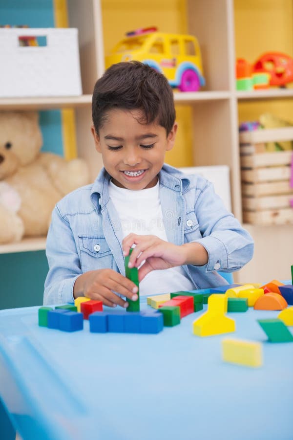Cute Little Boy Playing with Building Blocks Stock Photo - Image of ...