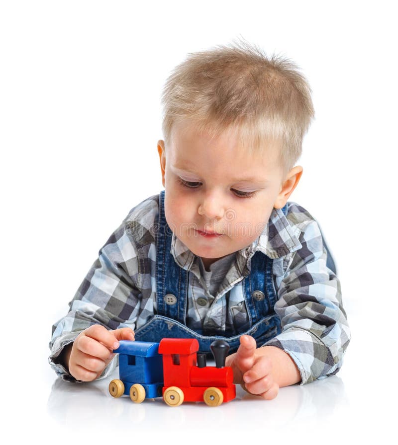 Cute Little Boy Playing Trains Stock Image - Image of health, leisure ...