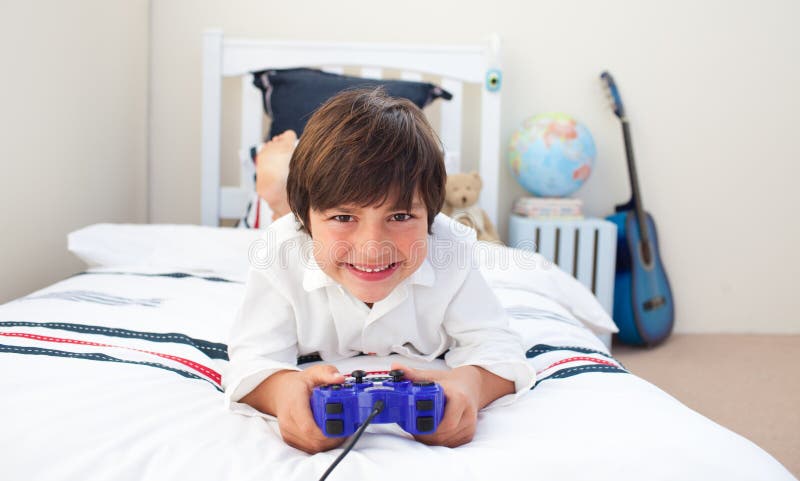 Cute Little Boy Playing Video Games Stock Image - Image of expression ...
