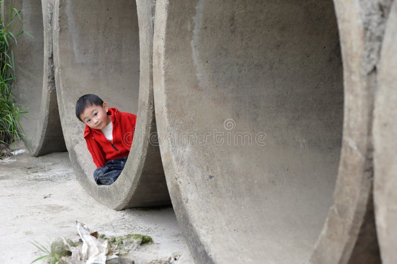 Boy in a Pipe - Sewer Drainage Drain Stock Photo - Image of drainage ...
