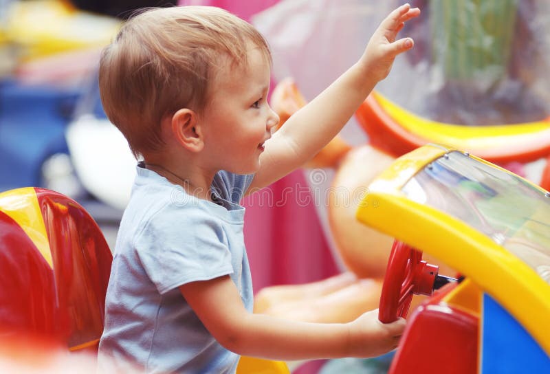 Cute Little Boy Riding a Toy Car Stock Photo - Image of little, people ...