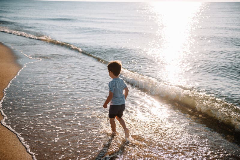 Cute Little Boy Running on Beach and Have Fun Stock Image - Image of ...