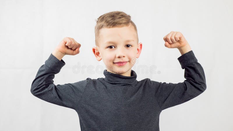 Cute Little Boy Shows Strength. on a White Background Stock Image ...