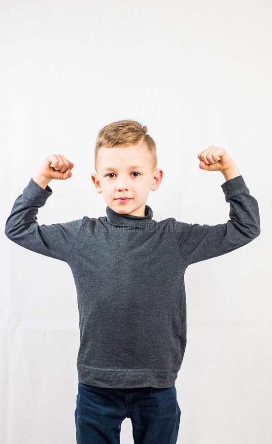 Cute Little Boy Shows Strength. on a White Background Stock Image ...