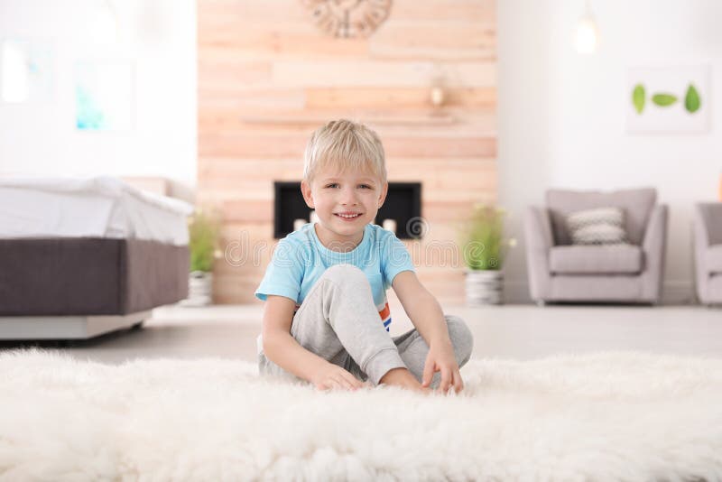 Cute Little Boy Sitting on Fur Rug Stock Image - Image of cute, full ...