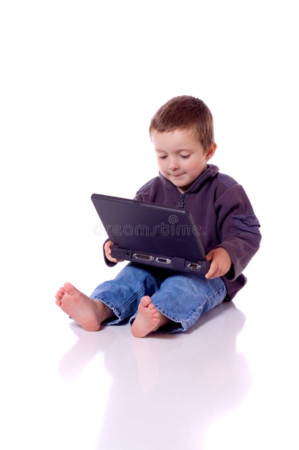 Cute boy with a laptop stock image. Image of technology - 29850899