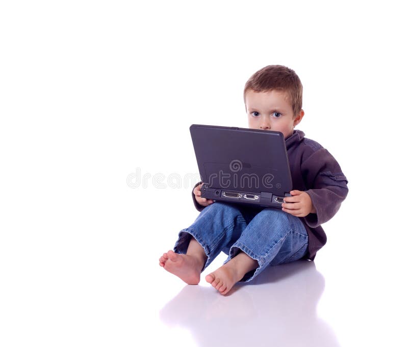 Cute boy with a laptop stock image. Image of childhood - 29850891