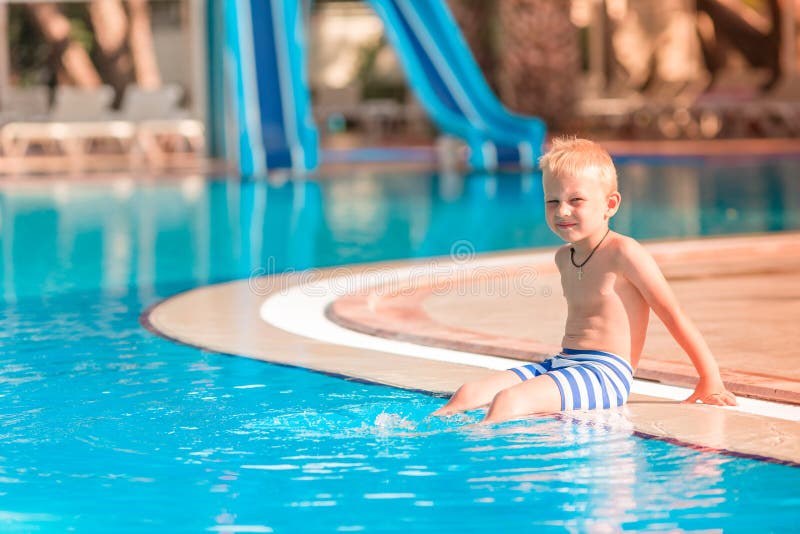 125 Happy Boy Sitting Edge Swimming Pool Photos - Free & Royalty-Free ...