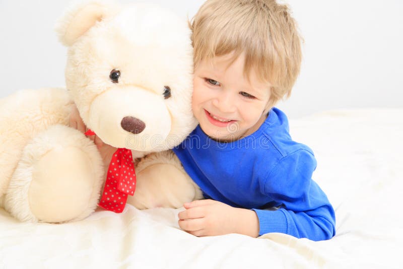 Little boy with teddy bear stock image. Image of kids - 39096055