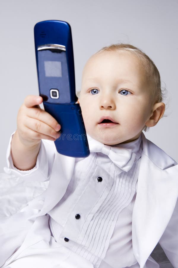 Cute little boy in white. stock image. Image of beautiful - 11388373