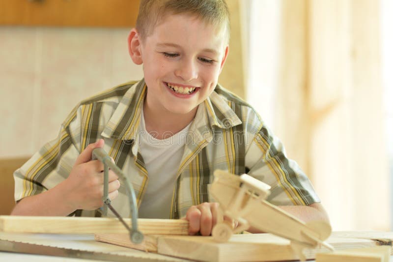 Portrait of Cute Little Boy Working with Wood in Workshop Stock Image ...