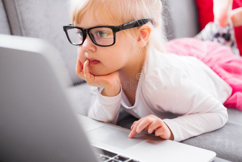 Cute Little Caucasian Girl Using Laptop Stock Image - Image of smile ...