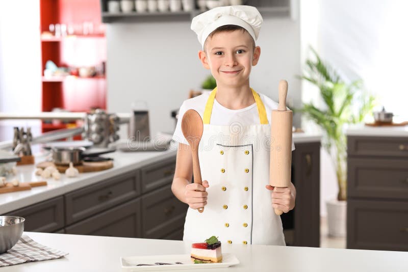 Cute Little Chef with Utensils in Kitchen Stock Photo - Image of cafe ...
