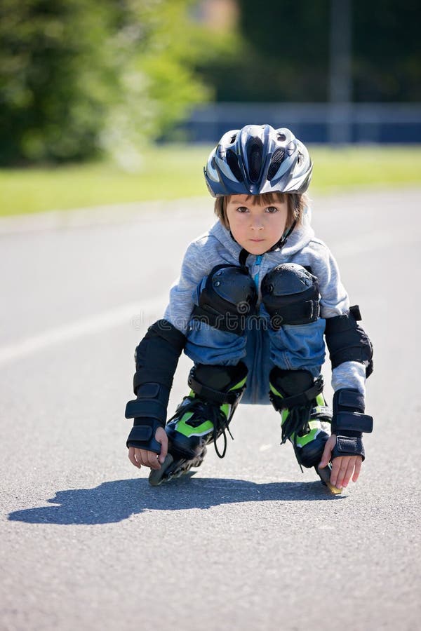 Cute Little Child, Boy, Riding on a Skating in the Park Stock Photo ...