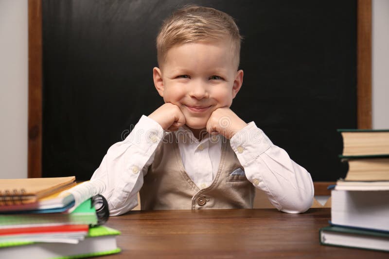Cute Little Child at Desk. First Time at School Stock Photo - Image of ...