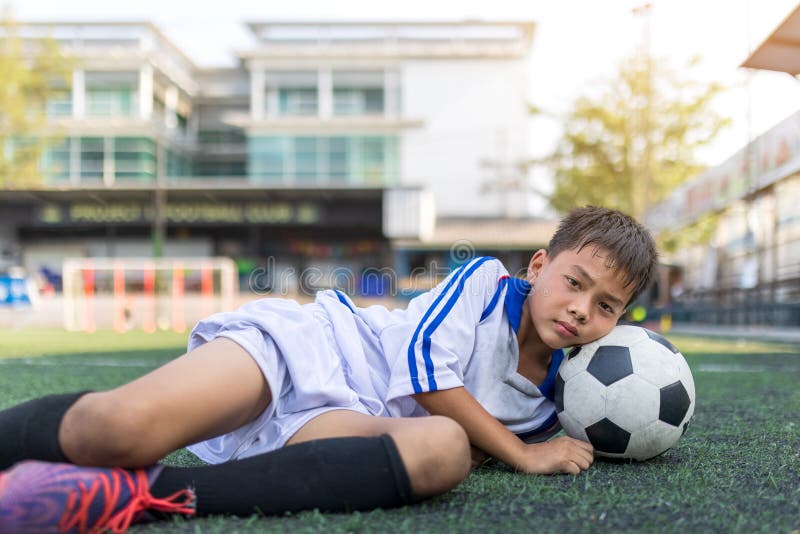 Cute Little Child Dreams of Becoming a Soccer Player. Sport and ...