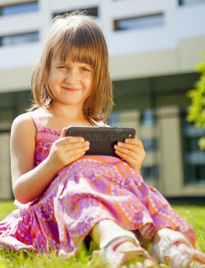 Cute Little Child Girl Using Smartphone and Learnig Remote Distance ...