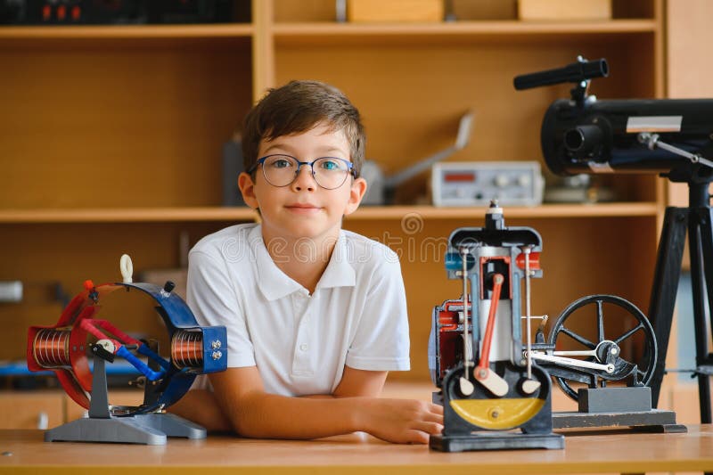 Cute Little Child at Physics Lesson in Classroom Stock Image - Image of ...