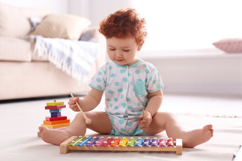 Cute Little Child Playing with Xylophone on Floor Stock Image - Image ...