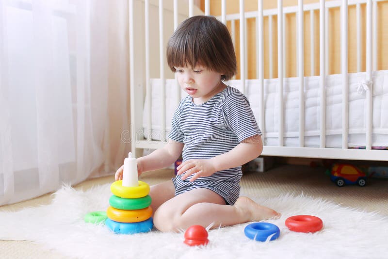 Cute Little Child Plays Nesting Blocks Stock Image - Image of erector ...