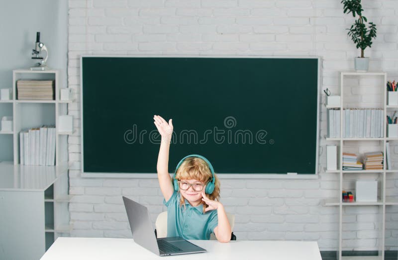 Cute Little Child with Raised Hand Using Laptop Computer, Kid Boy ...